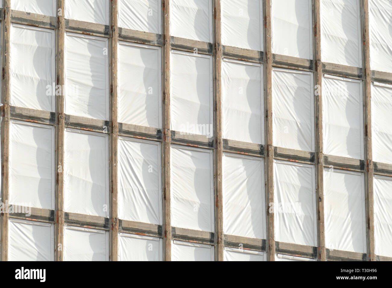 Tarpaulin, construction site, scaffolding, house facade Stock Photo - Alamy