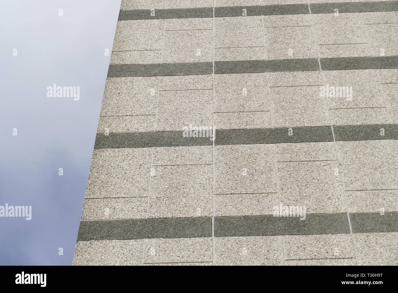 Gray concrete wall, concrete slabs with struts on a house wall Stock ...