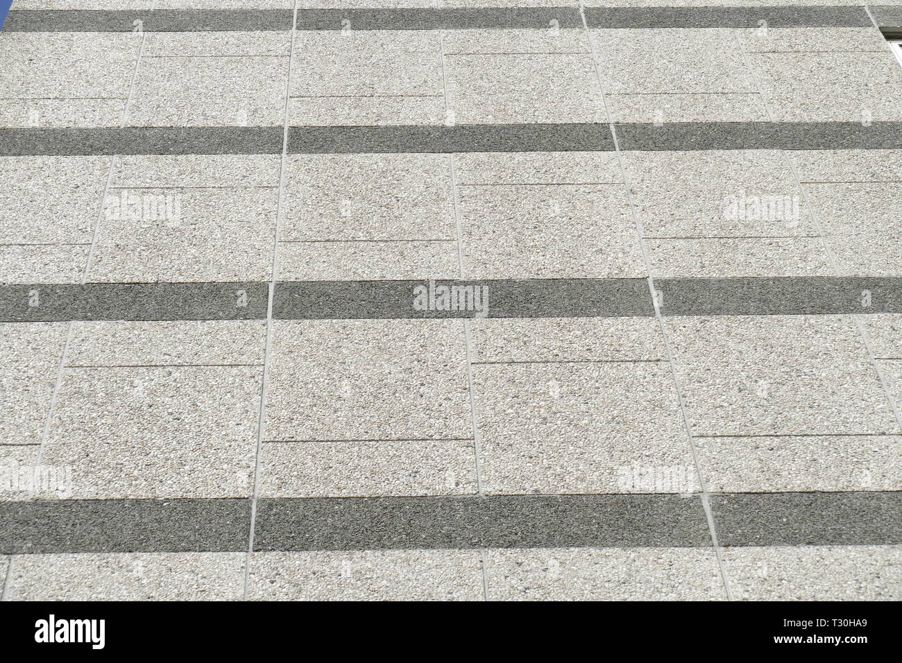 Gray concrete wall, concrete slabs with struts on a house wall Stock ...