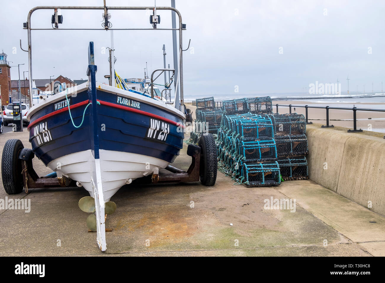 fishing boat & lobster pots on redcar sea front, redcar, uk Stock Photo ...