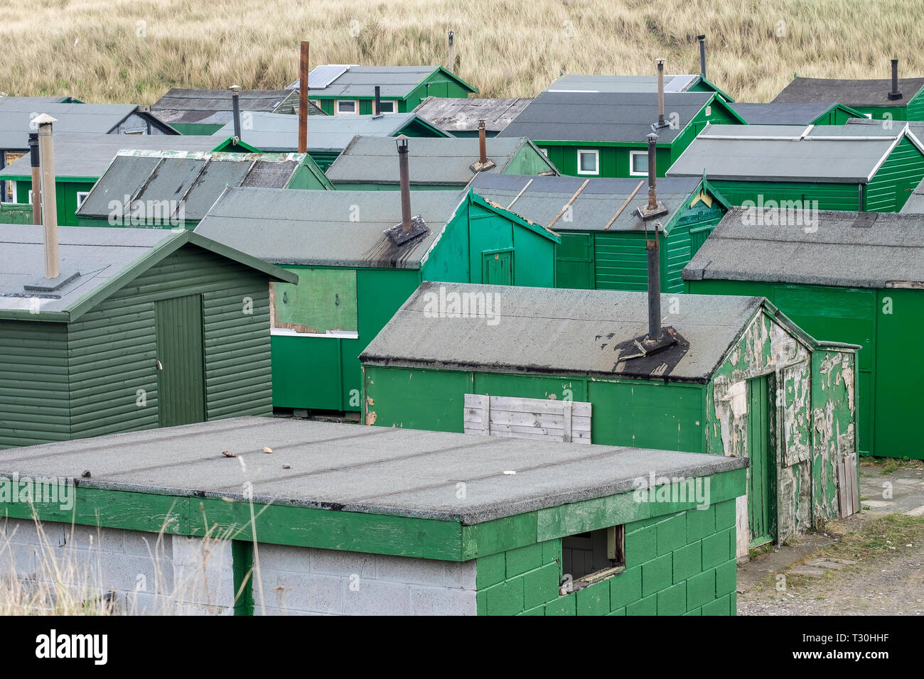 fishermans huts at paddy's hole, south gare, redcar, uk Stock Photo - Alamy