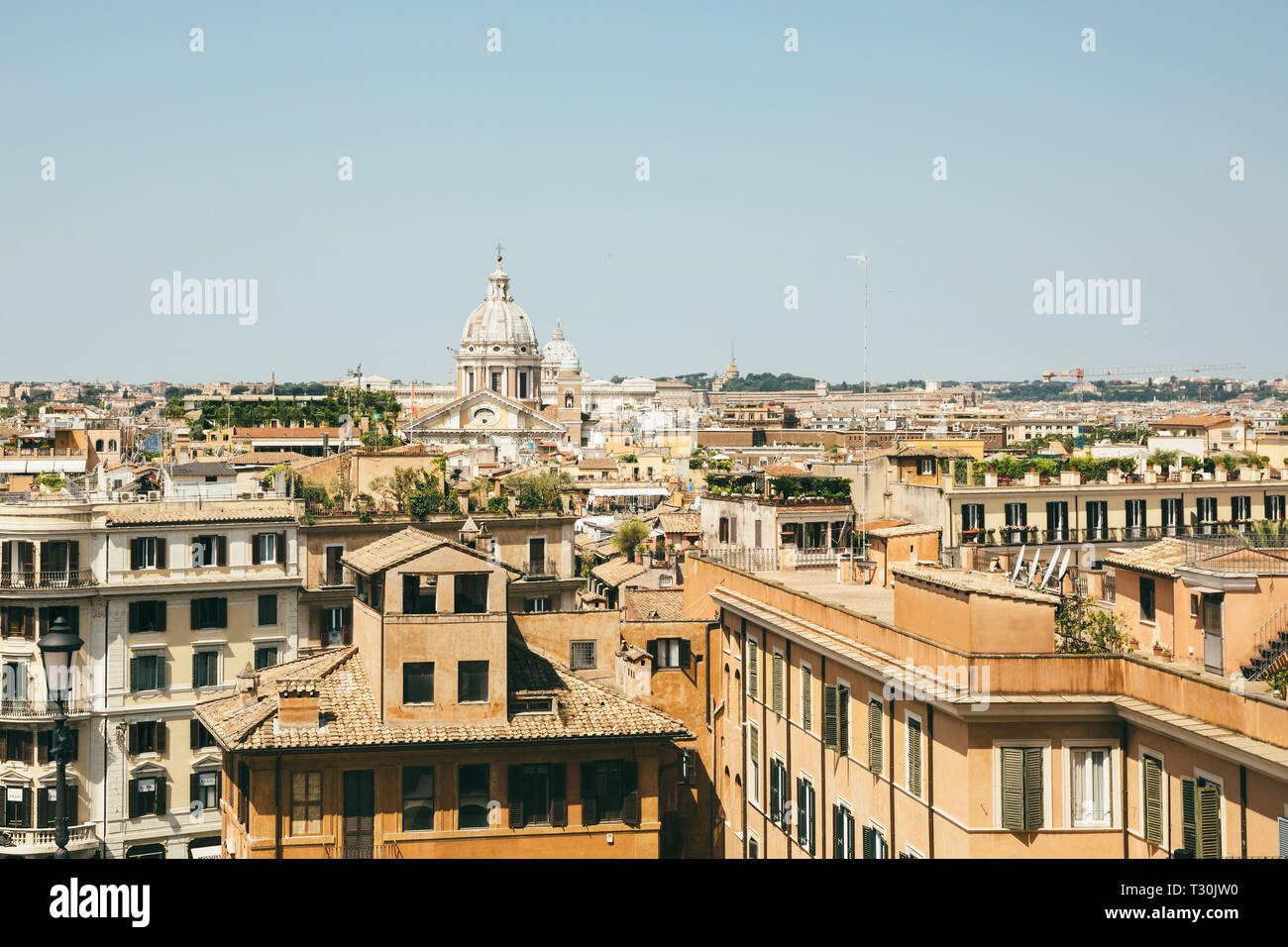 Panoramic view of city Rome with old houses from the Spanish steps ...