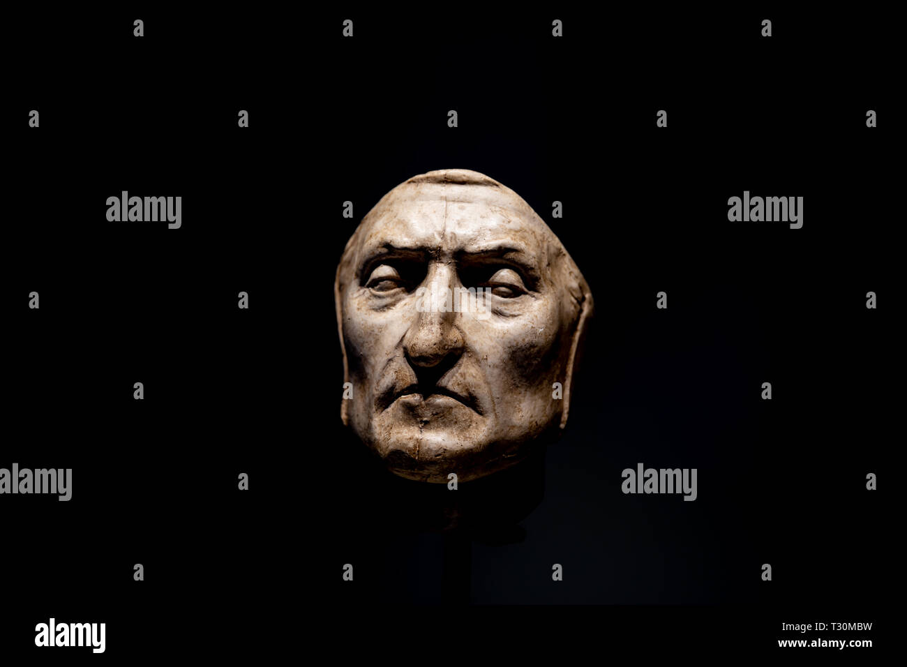 Florence, Italy - June 24, 2018: Closeup view of death mask of Dante ...