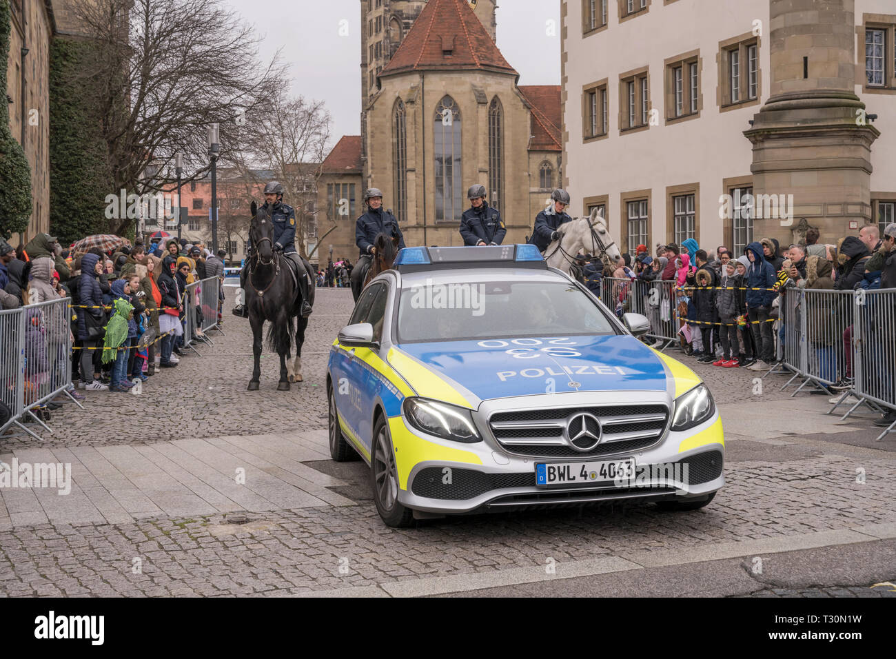 STUTTGART, GERMANY - MARCH 5: police patrol car and four policemen on ...