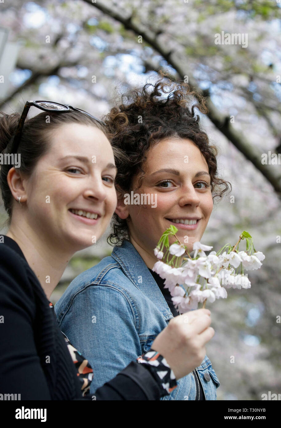 Vancouver, Canada. 4th Apr, 2019. People pose for photos with cherry ...