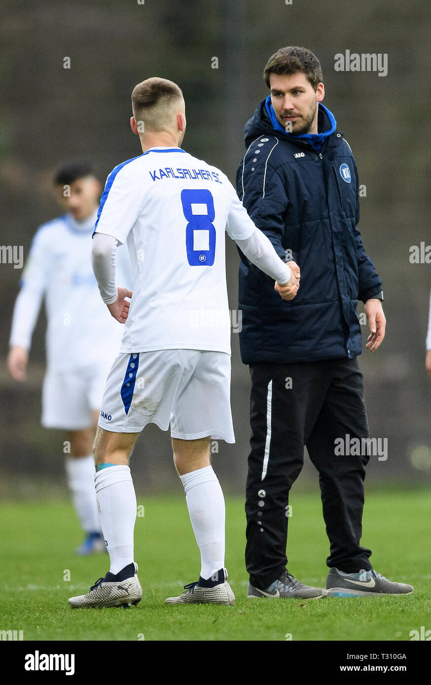 Karlsruhe, Deutschland. 05th Apr, 2019. Coach Michael Bischof (KSC) and ...