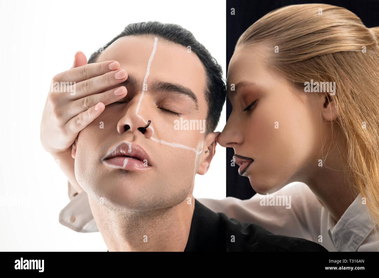 Model closing eye. Blonde-haired appealing model closing eye of ...
