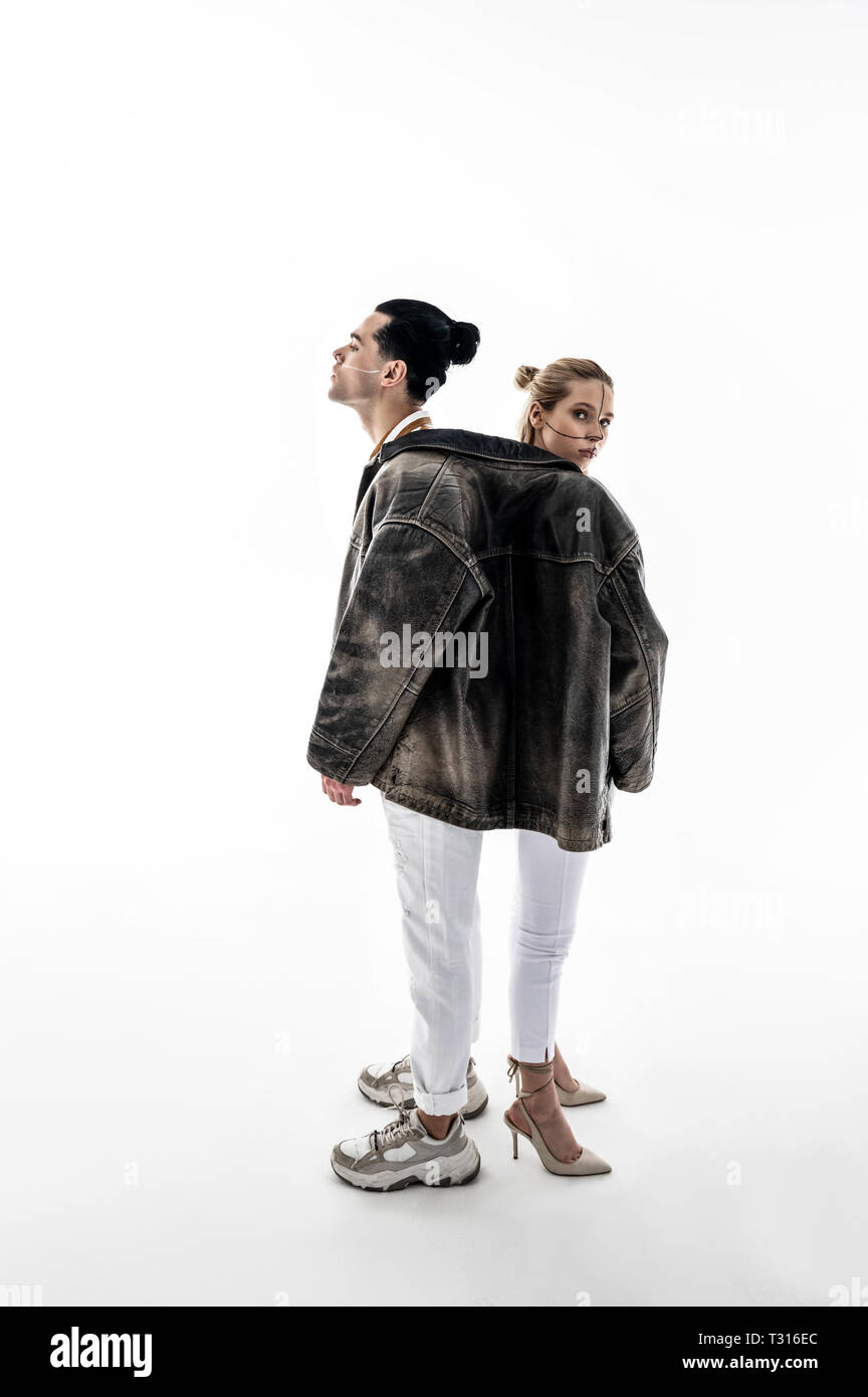 Promoting clothes. Professional young creative models showing nice ...