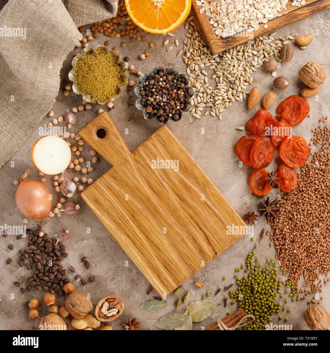 Dried fruits cereals spices and nuts organic healthy snacks on a ...