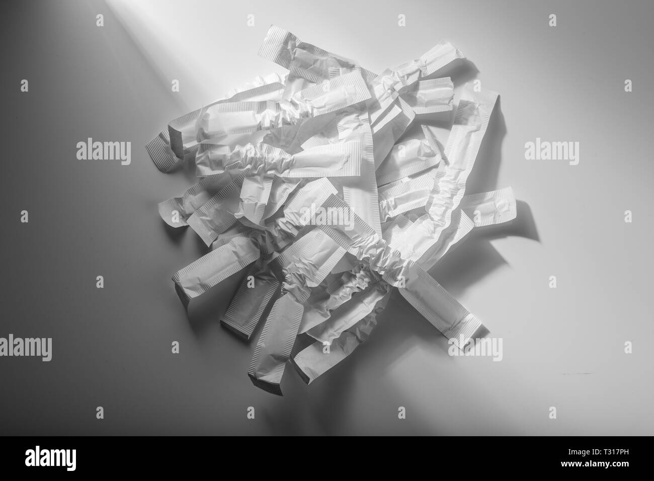 Paper wasting concept. Empty Paper wrapping on white background Stock ...