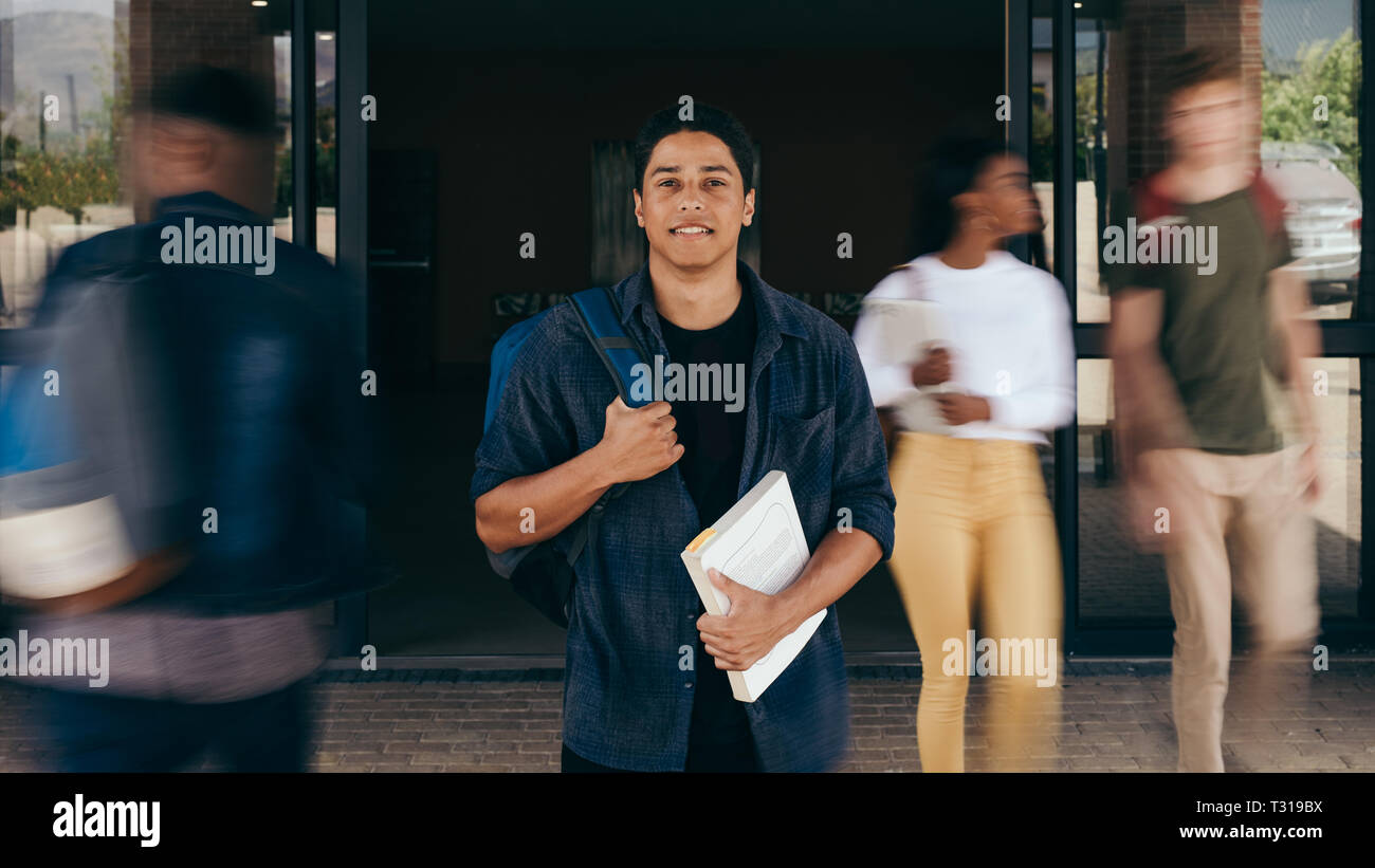 Male high school student walking hi-res stock photography and images ...