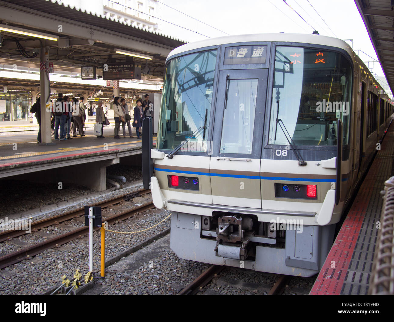 A JR Nara Line train waiting at Kyoto Station in Kyoto, Japan. This ...