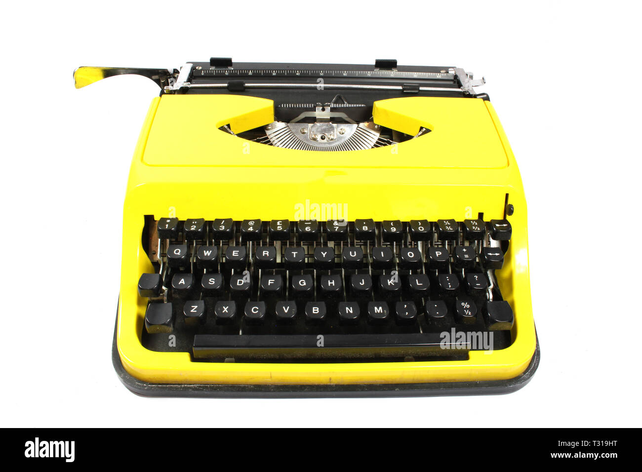 Retro Yellow Typewriter on a White Background Stock Photo - Alamy