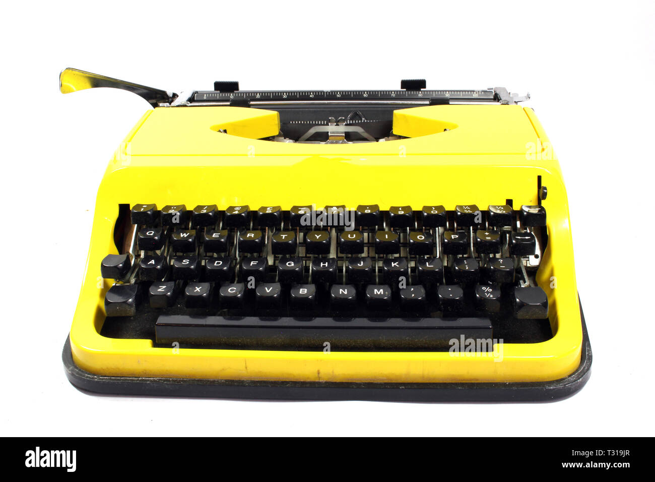 Retro Yellow Typewriter on a White Background Stock Photo - Alamy