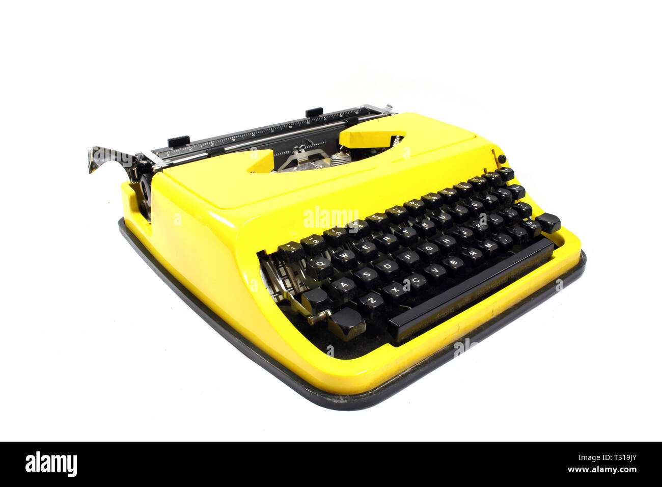 Retro Yellow Typewriter on a White Background Stock Photo - Alamy