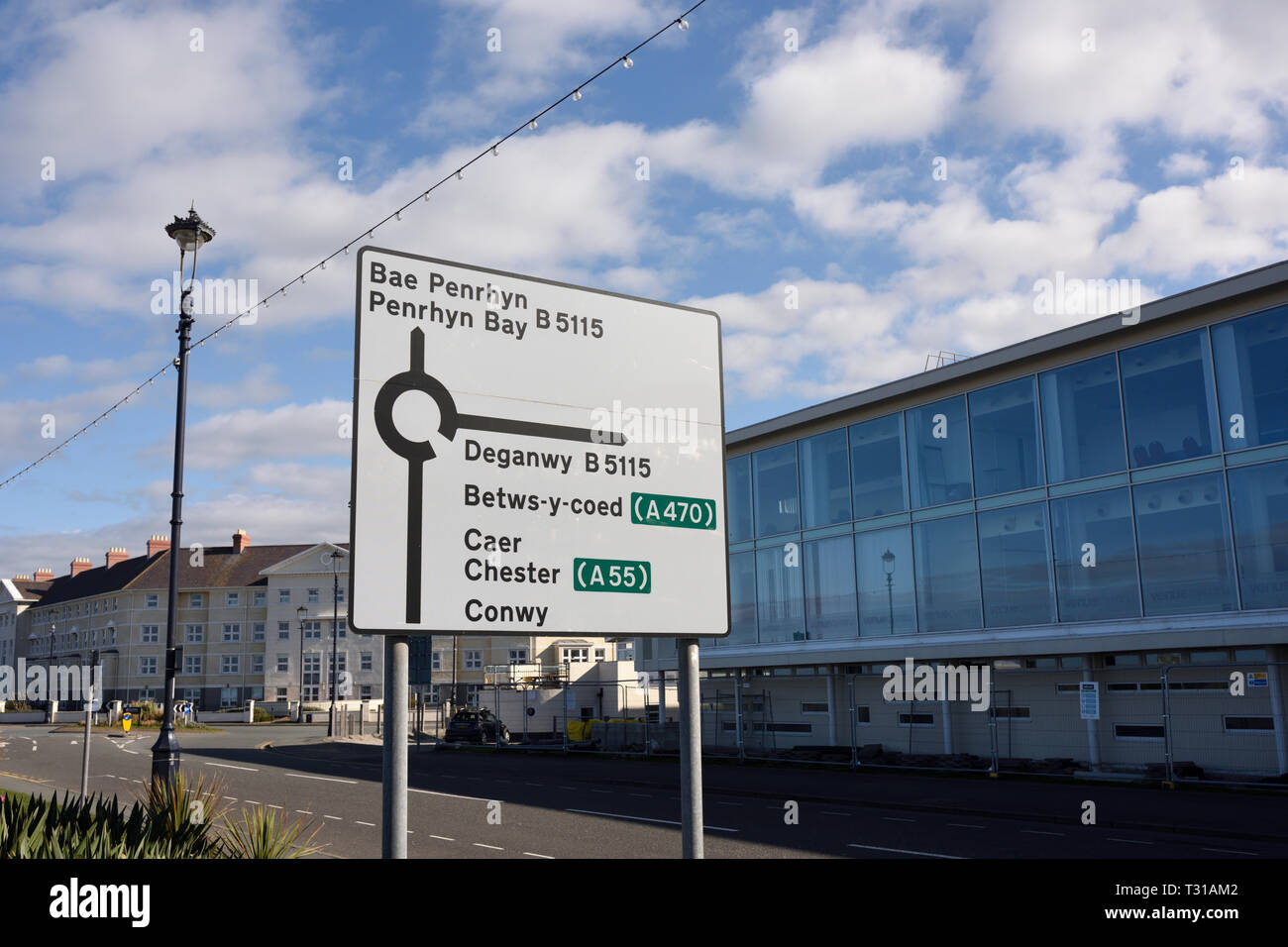 Bilingual welsh and english Road directions sign with glass front ...