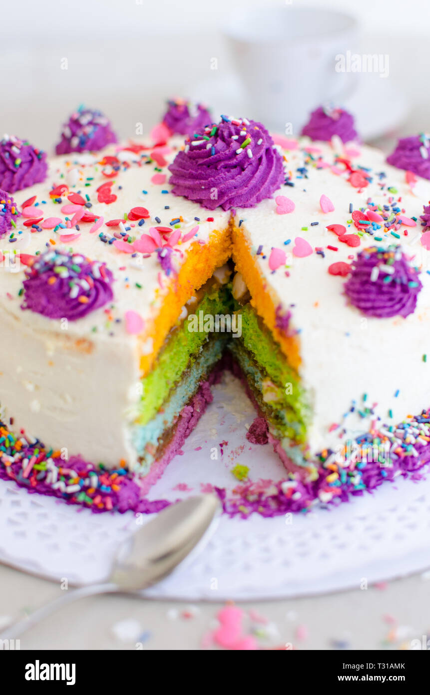 Rainbow cake close up Stock Photo - Alamy