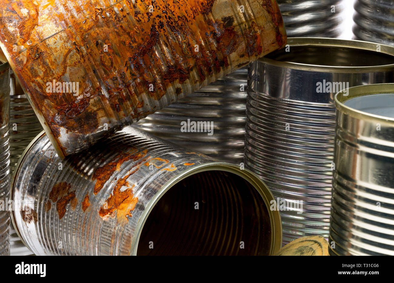 Stack of rusty empty tin cans close-up Stock Photo - Alamy