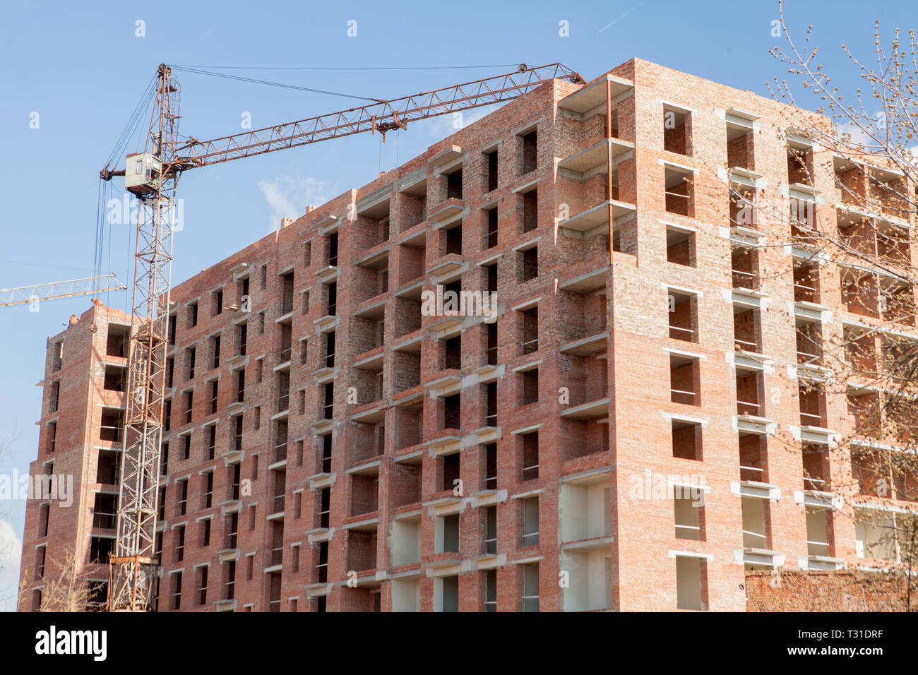 High-rise multi-storey buildings under construction. Tower cranes near ...