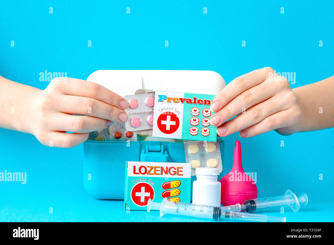 Flat lay composition with first aid kit on blue background Stock Photo ...