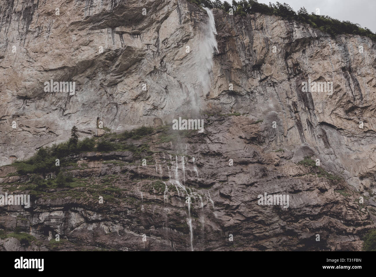 View waterfall Staubbach fall in mountains, valley of waterfalls in ...
