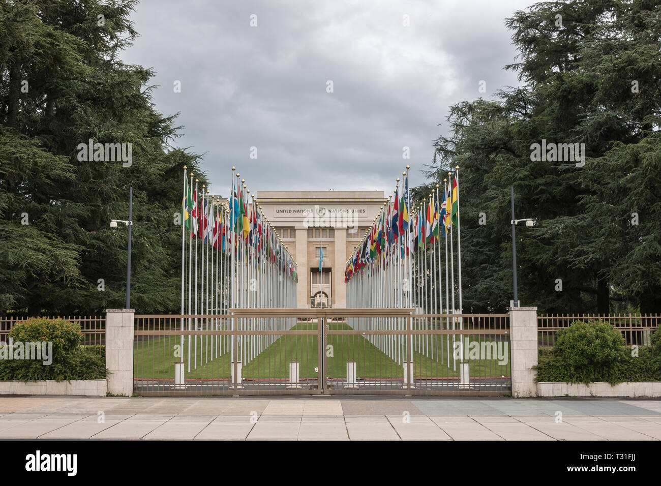 Geneva, Switzerland - July 1, 2017: National flags at the entrance in ...