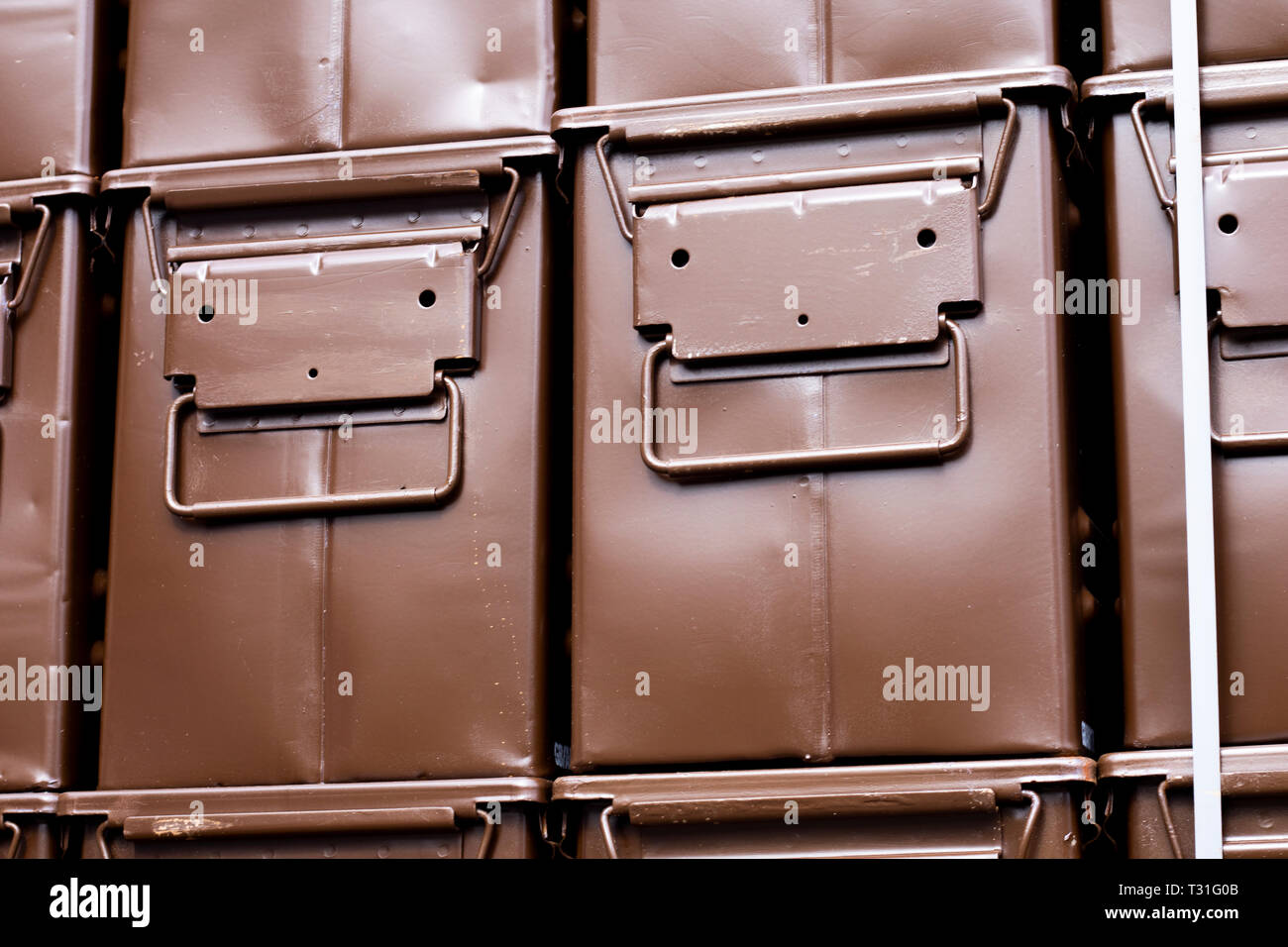 stacked brown ammunition boxes designed for the safe transportation of ...