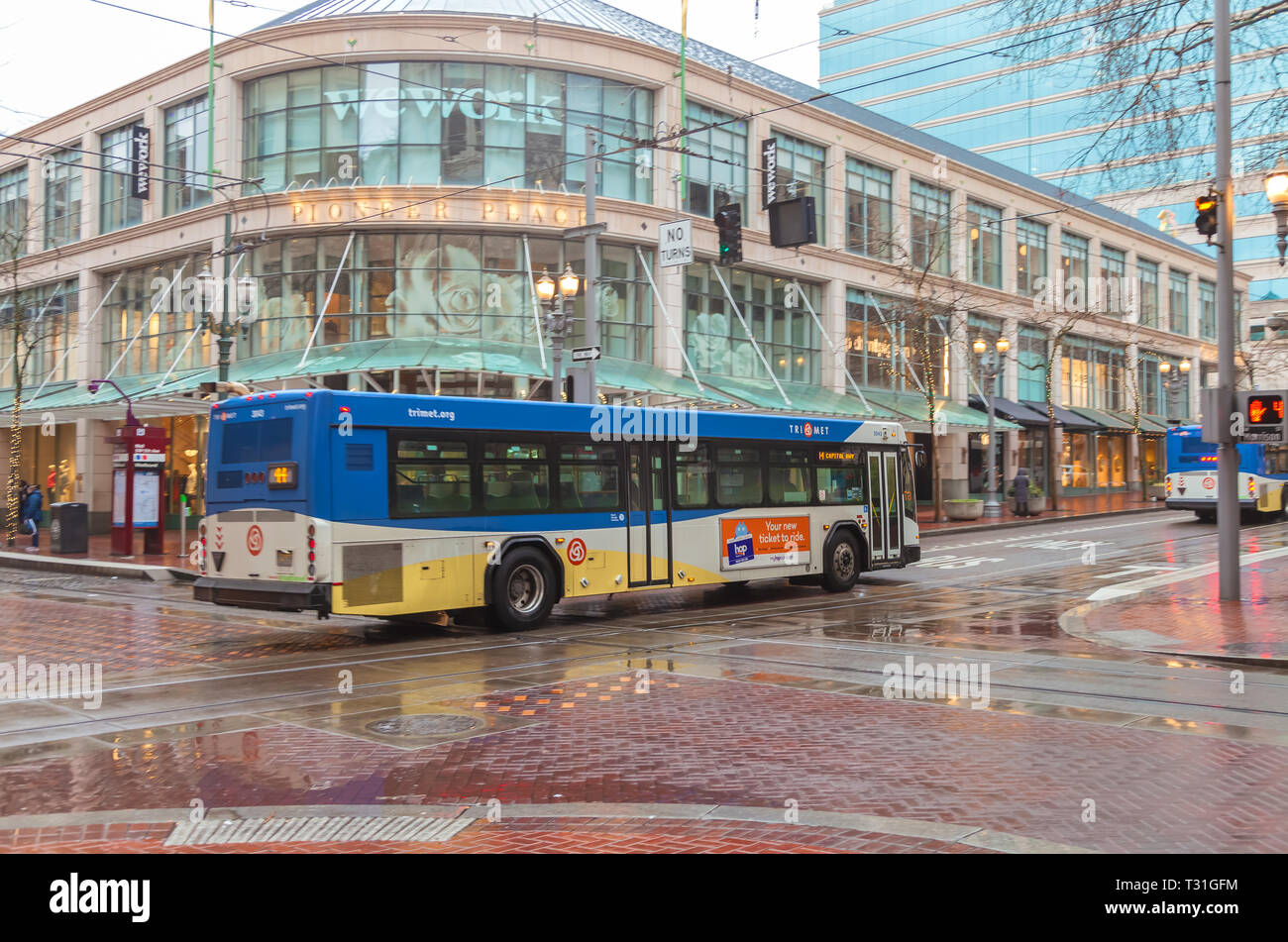 Tri-Met bus cross a intersection in downtown Portland, Oregon, United ...