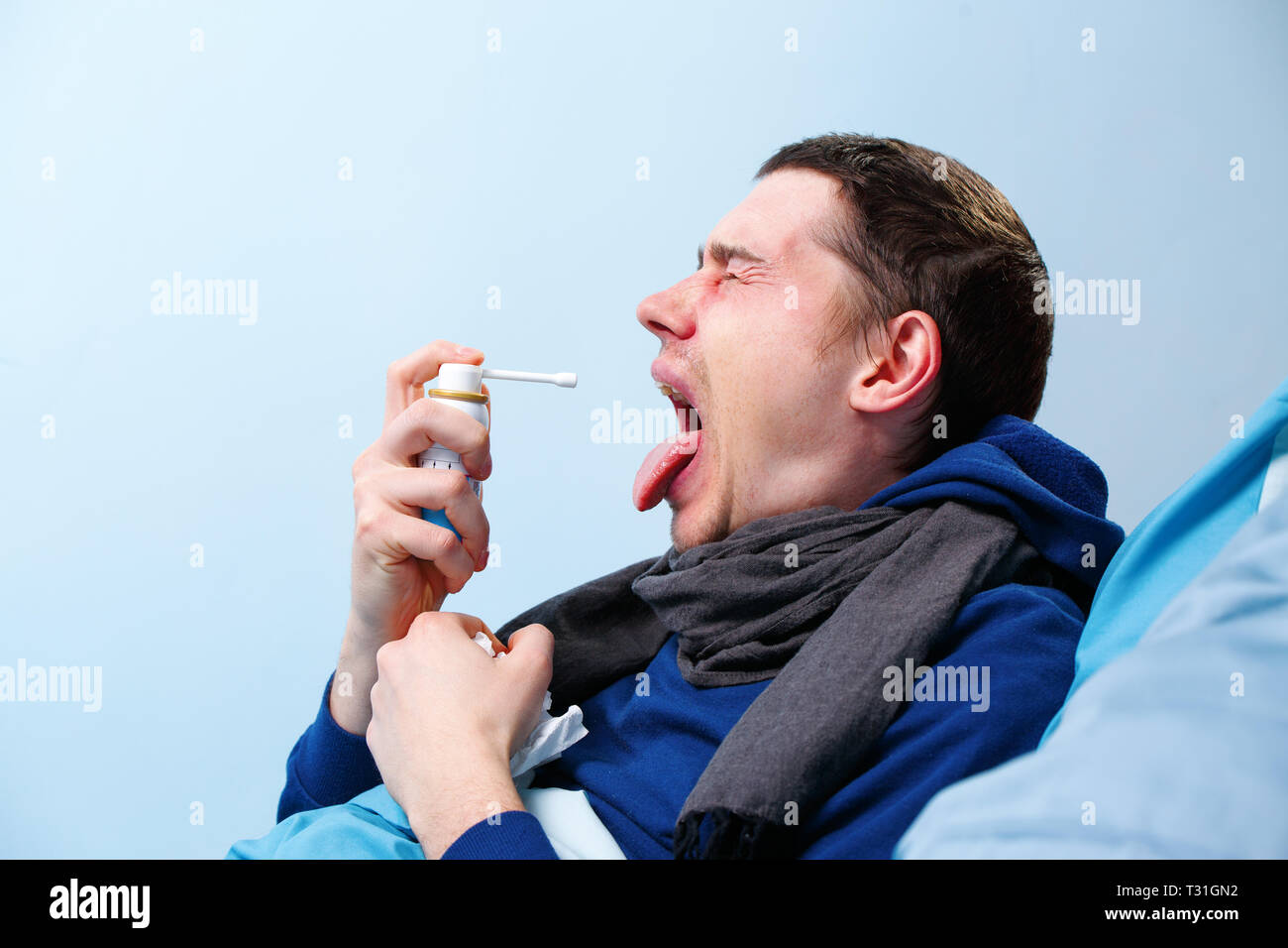 Man using mouth spray hi-res stock photography and images - Alamy