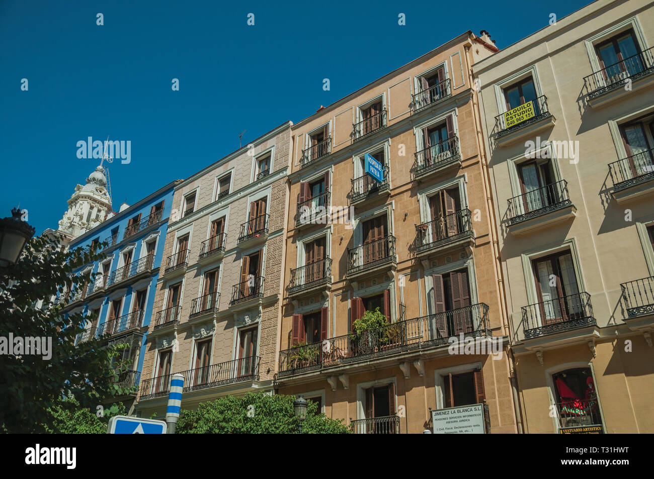 Colorful buildings with facade full of windows and balconies, in a ...