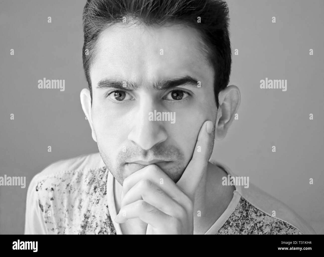 Young black man thinking hi-res stock photography and images - Alamy