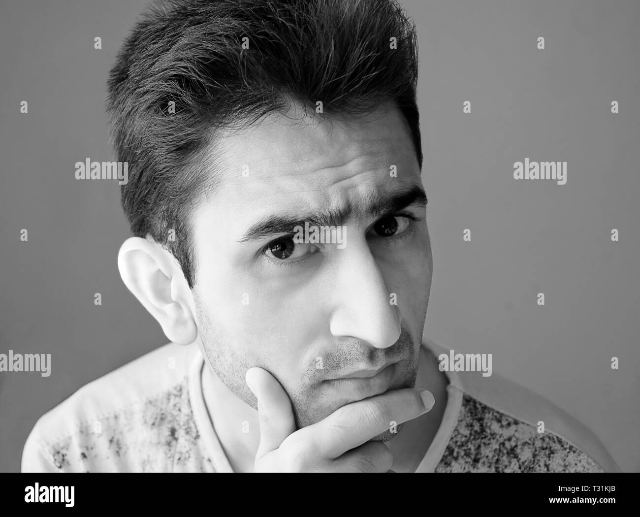 Contemplating expression hi-res stock photography and images - Alamy