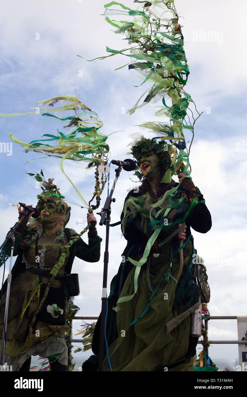 Female band singing in their fabulous green costumes on stage in the ...