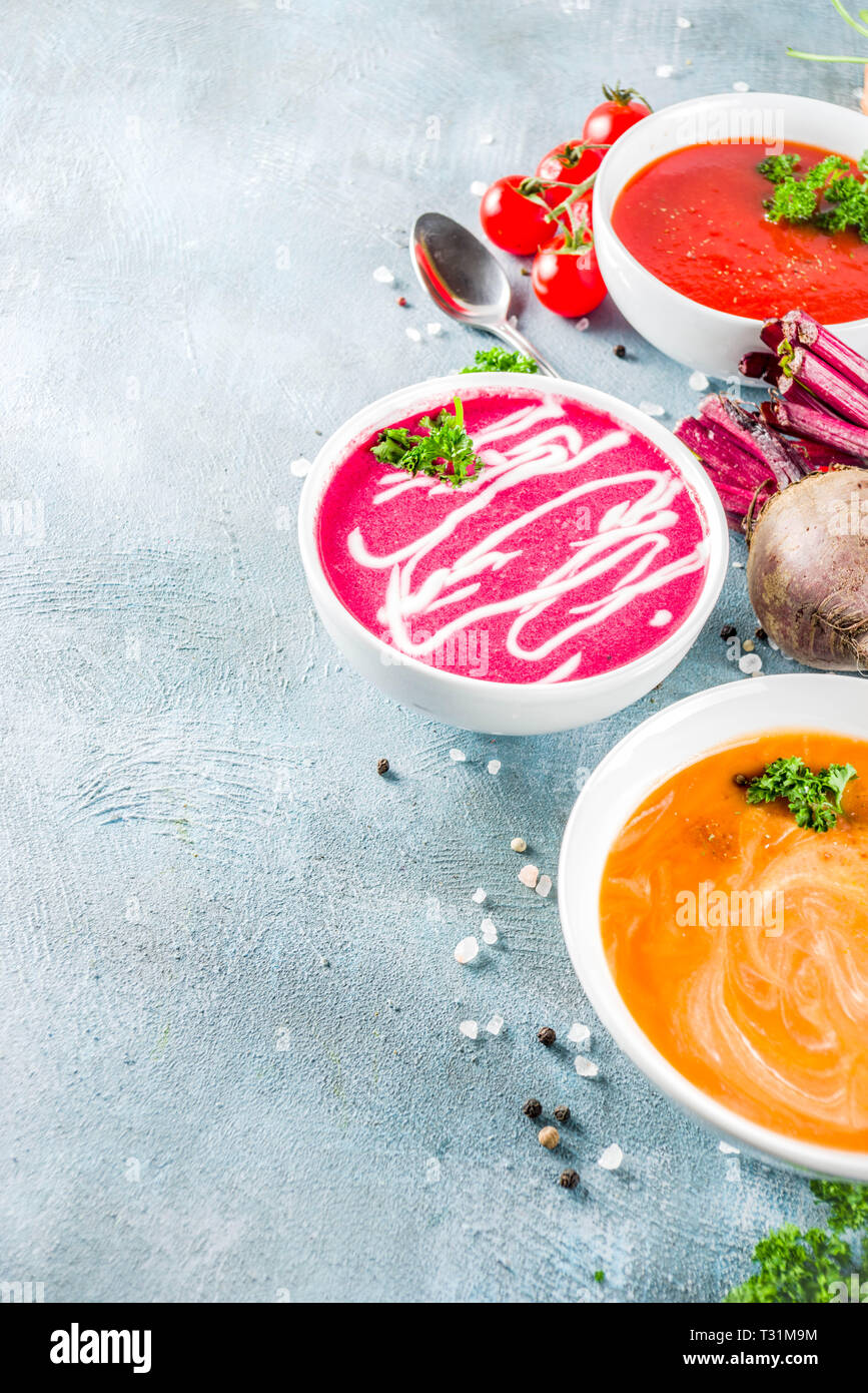 Set of various vegetable cream soups, Carrot, beet root, spicy tomato ...