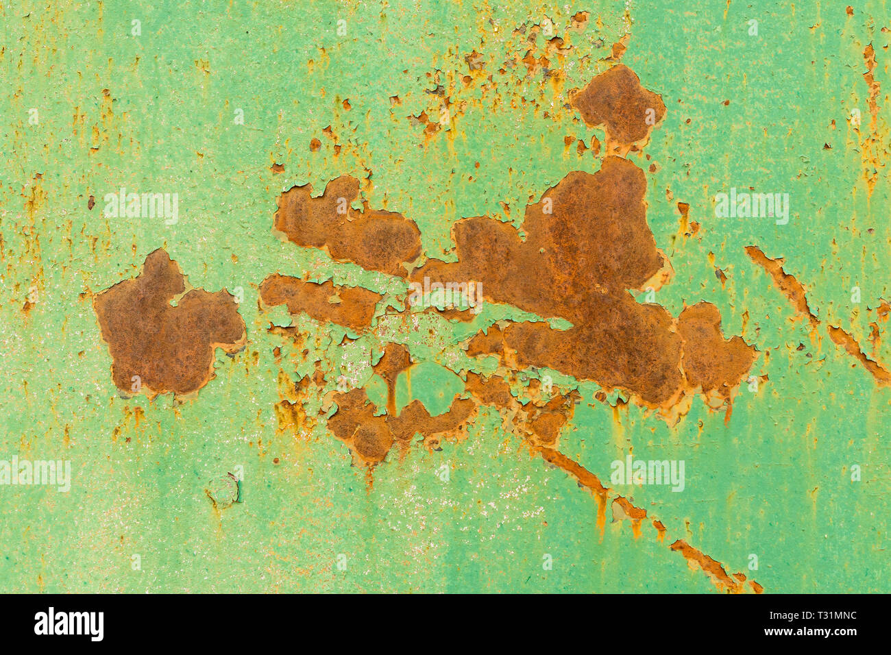 The cracked green paint on rusty metallic surface Stock Photo - Alamy