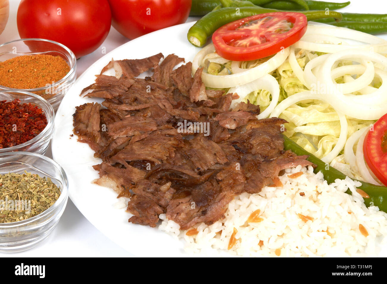 Doner kebap with rice and salads Stock Photo - Alamy