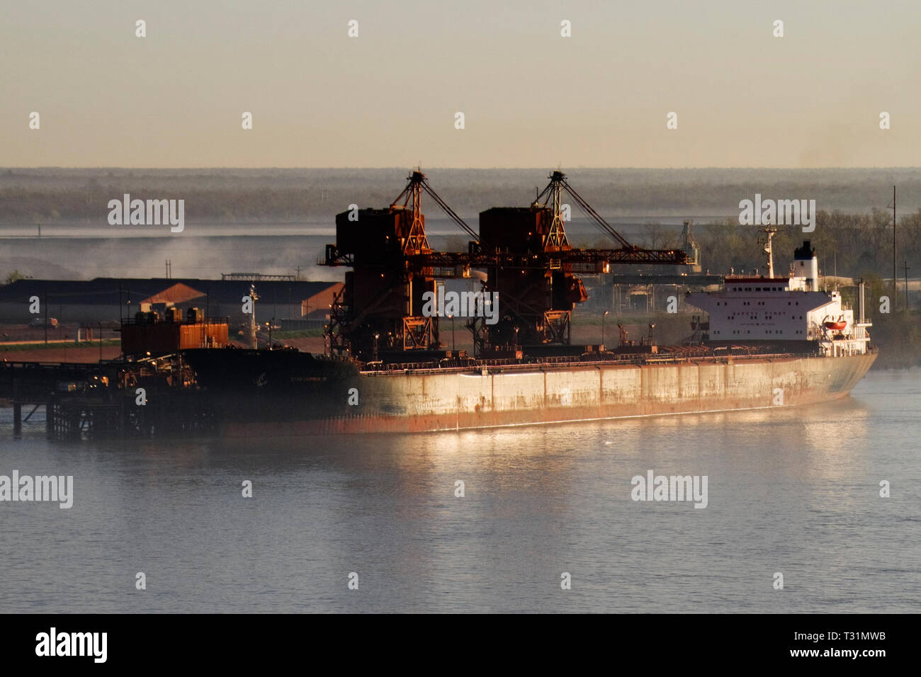Cargo Ship and Loading Cranes Stock Photo - Alamy