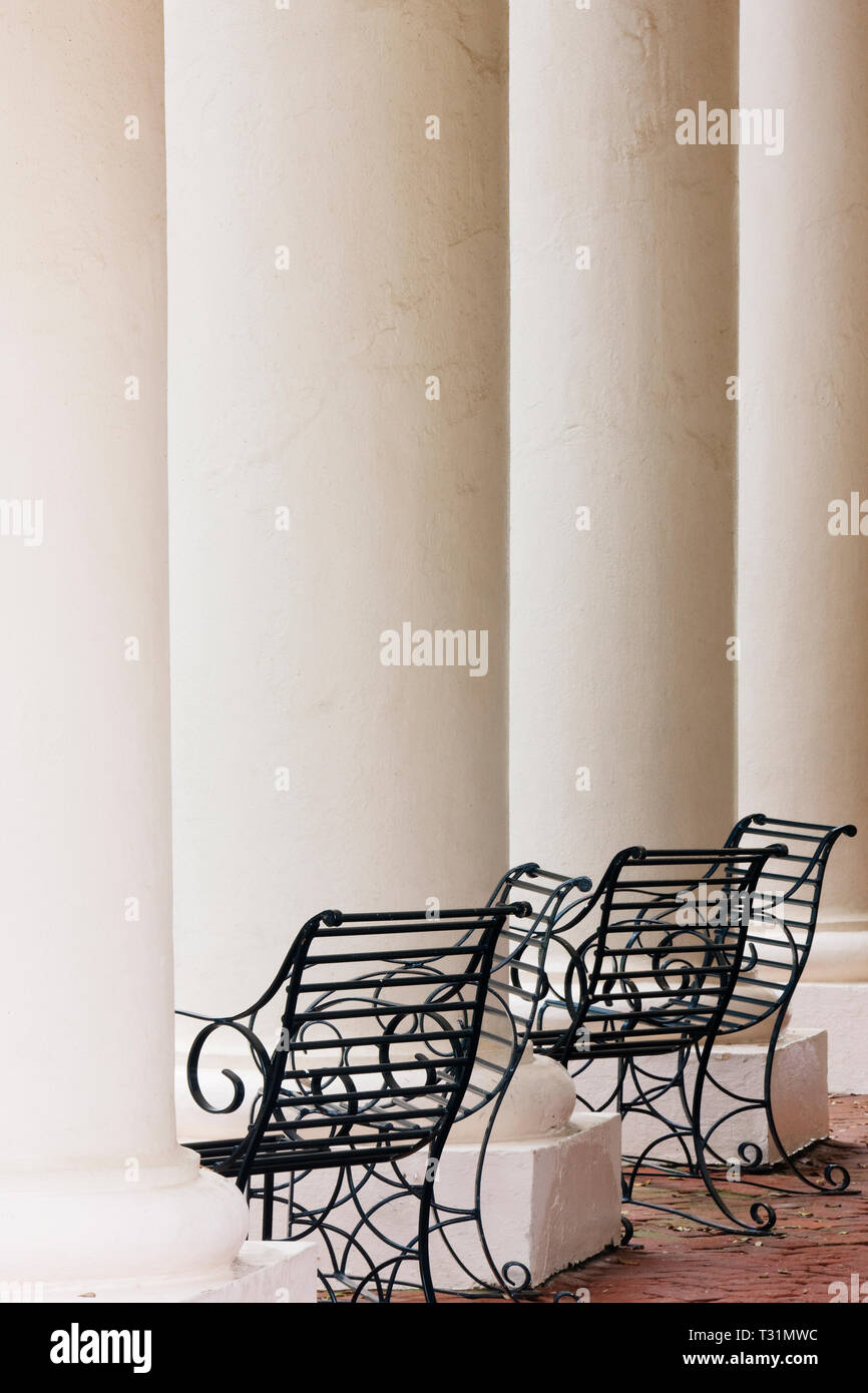 Wrought Iron Chairs and Columns Stock Photo - Alamy