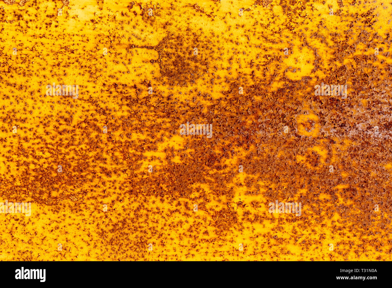 The cracked yellow paint on an old metal background Stock Photo - Alamy
