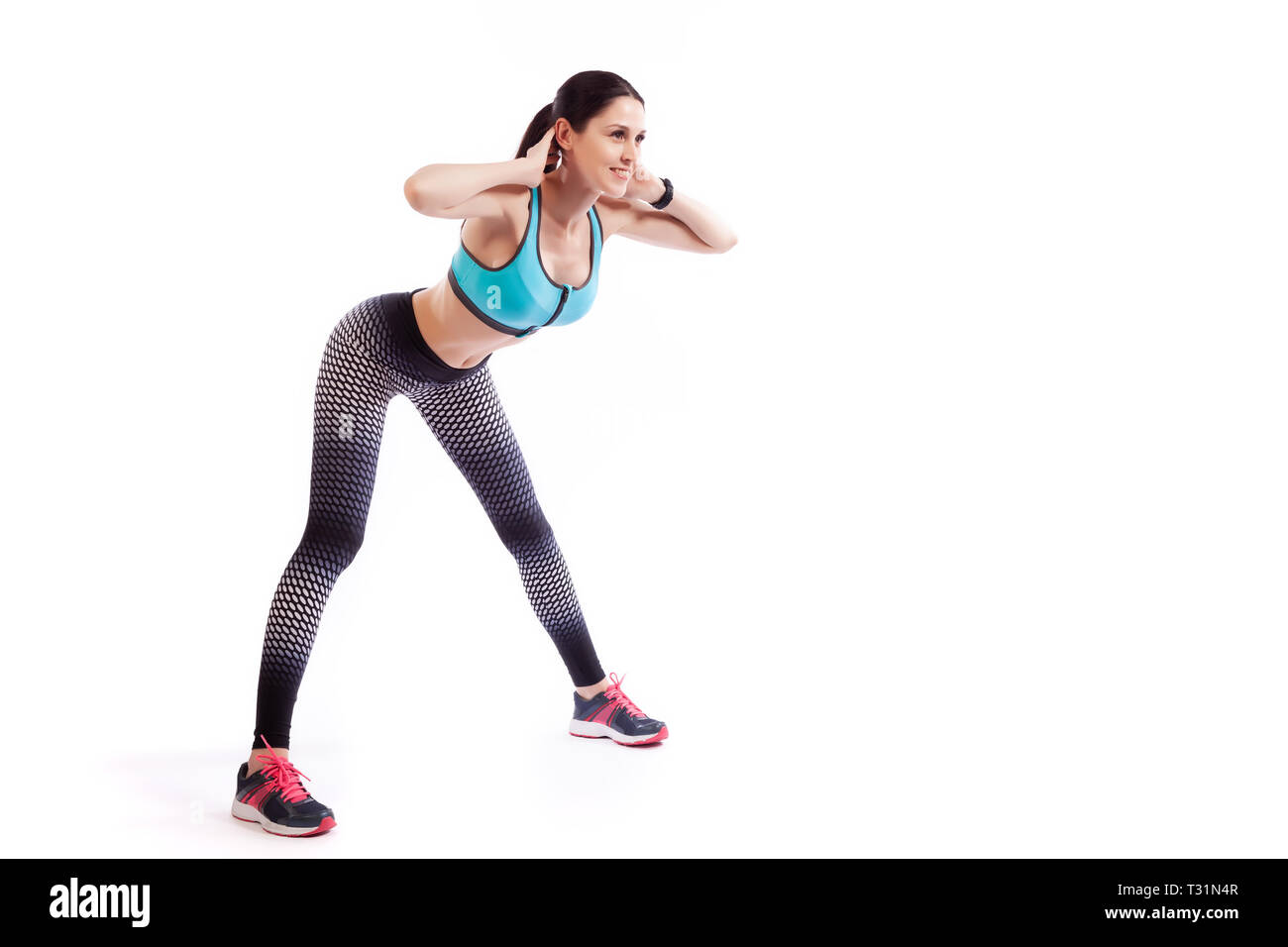 Woman exercise legs apart standing Cut Out Stock Images & Pictures - Alamy