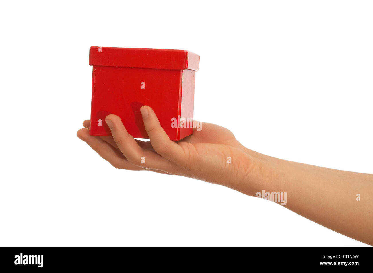 hand holding mini gift box on white background Stock Photo - Alamy