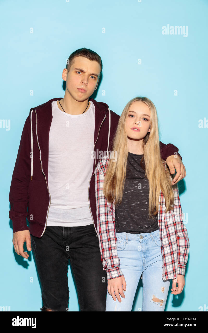 We are friends. Close up fashion portrait of two young cool hipster ...