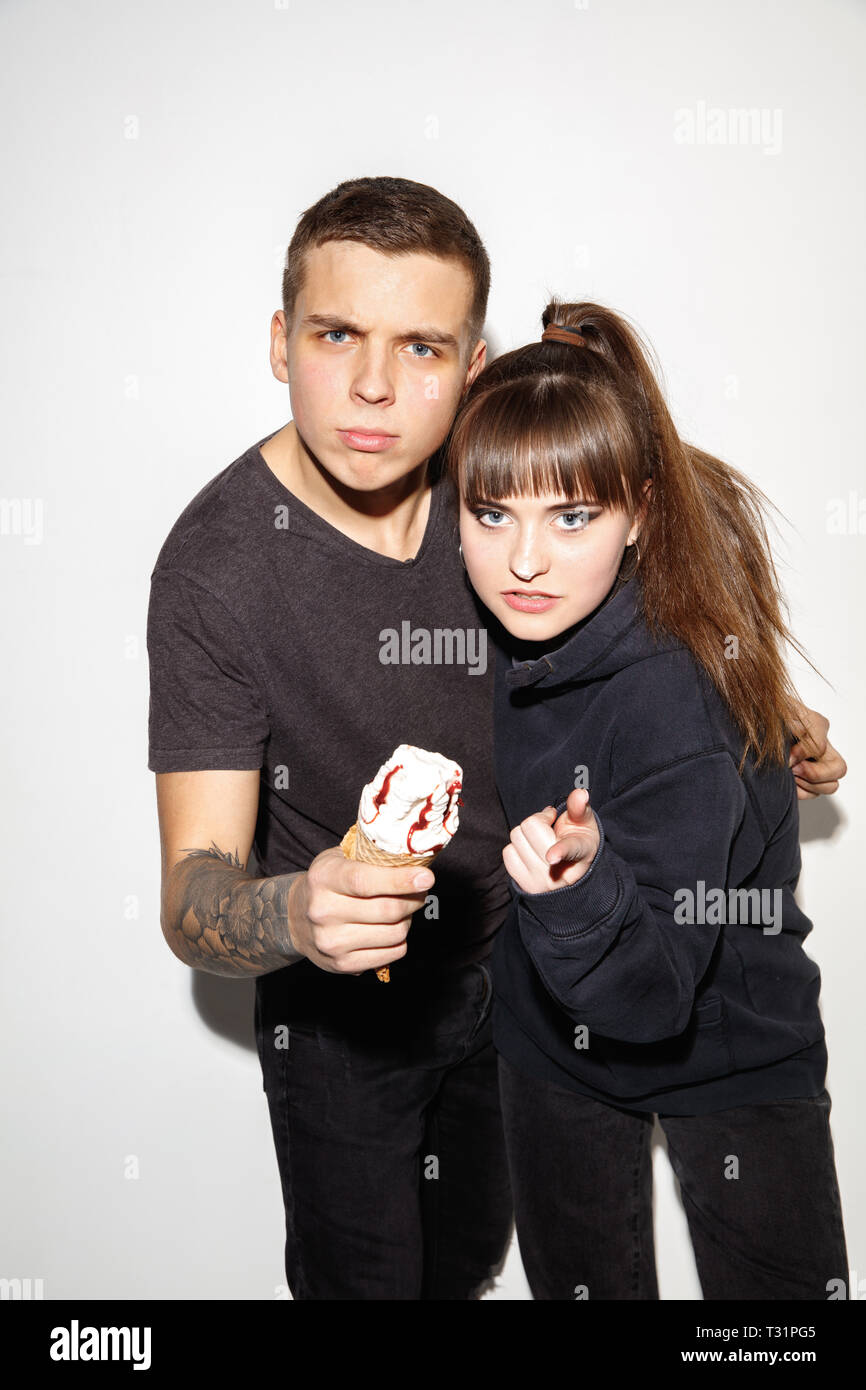 We are friends. Close up fashion portrait of two young cool hipster ...