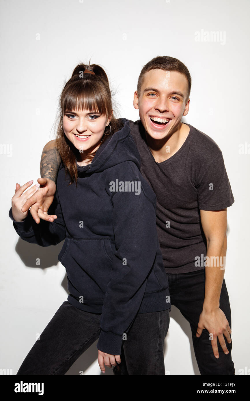 We are friends. Close up fashion portrait of two young cool hipster ...