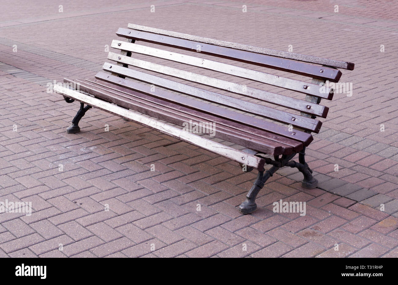 brown wooden bench on the street. furniture, city Stock Photo - Alamy