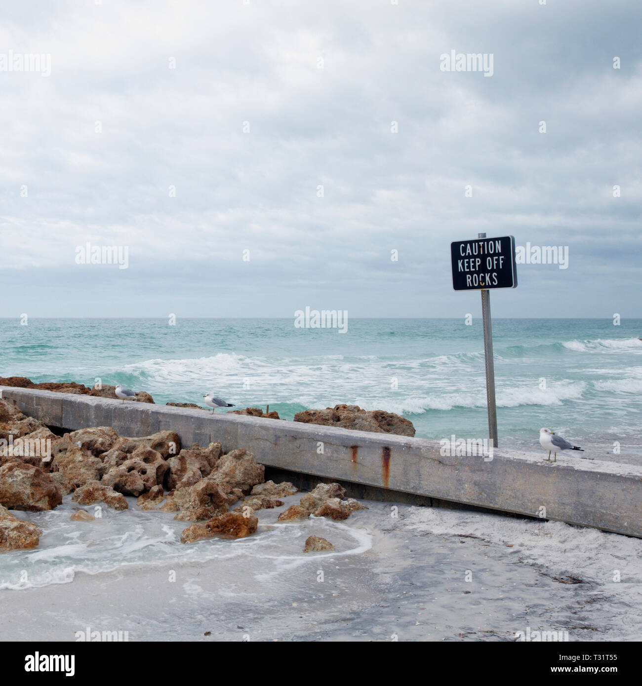 Warning Sign at the Beach Stock Photo - Alamy