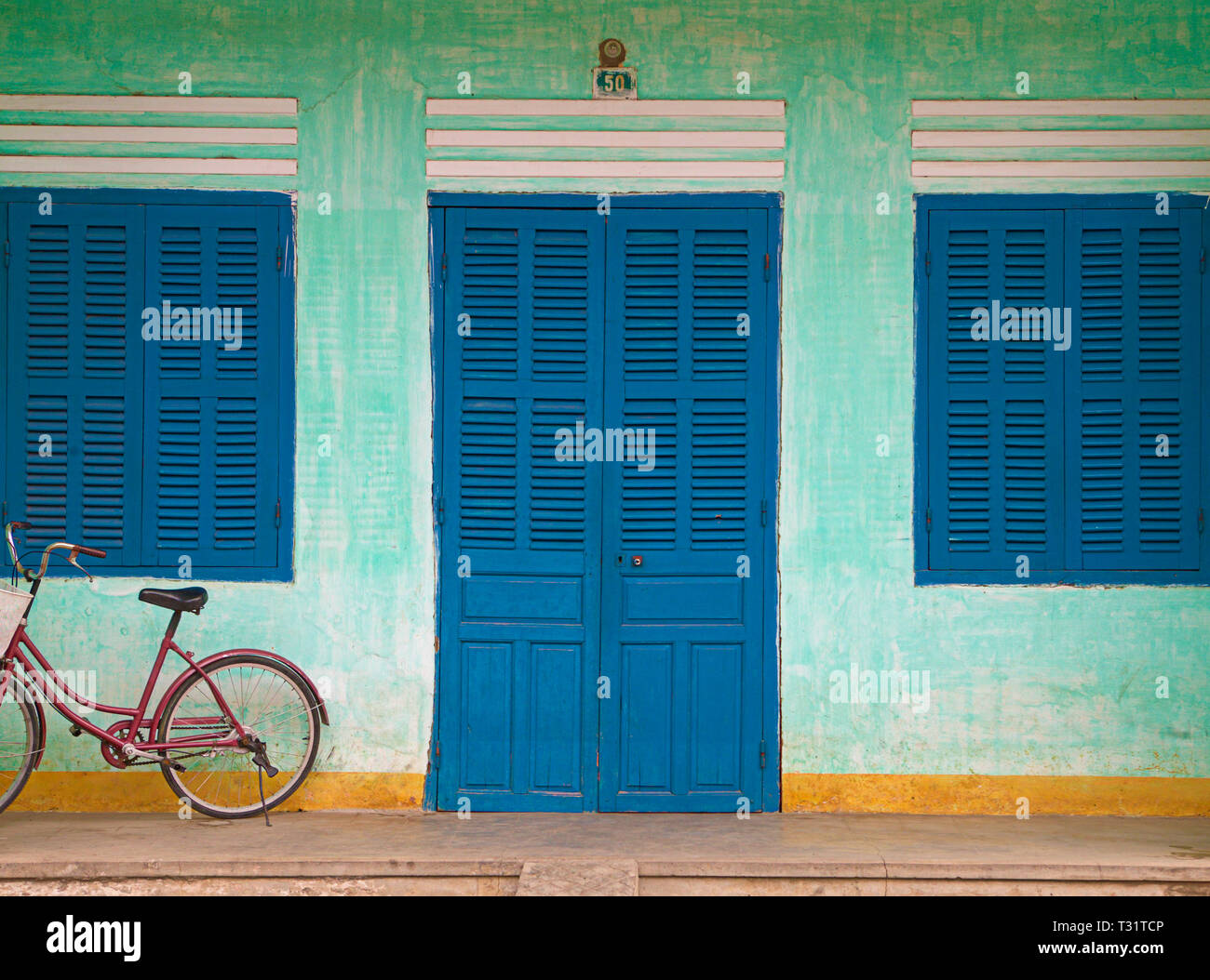 Bike Parked on a Front Porch Stock Photo - Alamy