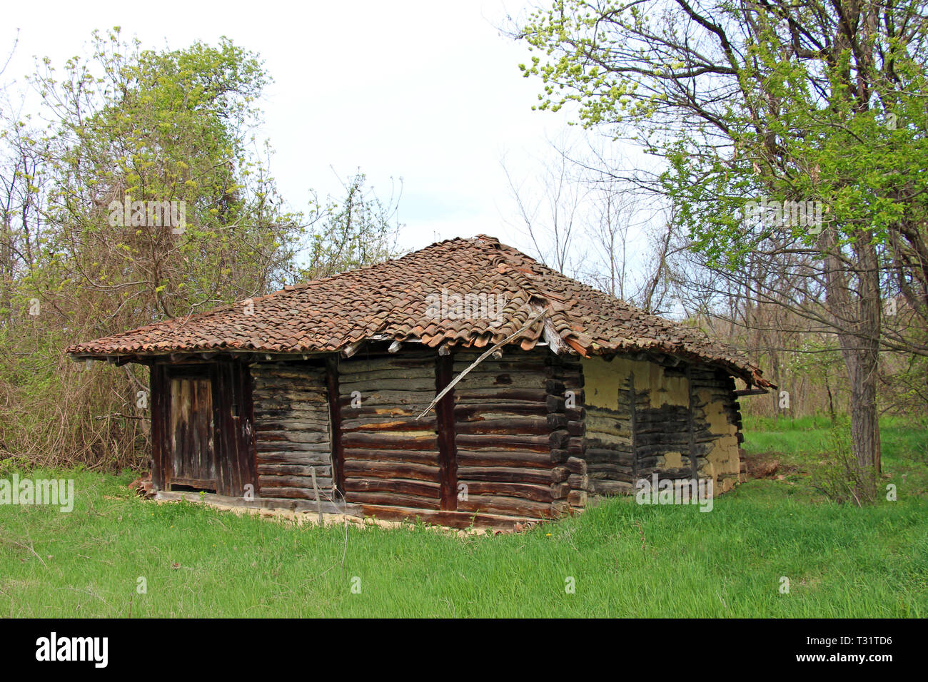 Ancient cottage made of wood in rural part of the country Stock Photo ...