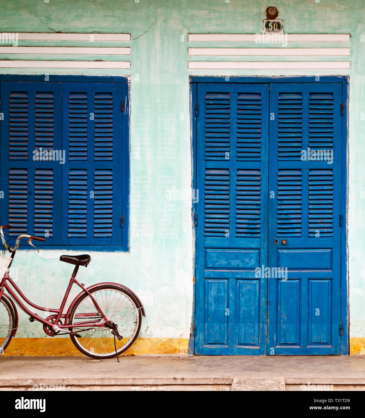 Bike Parked on a Front Porch Stock Photo - Alamy
