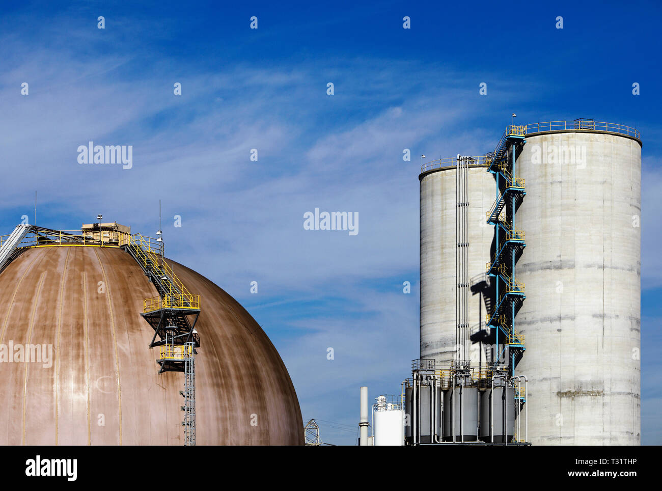Silos and energy storage at a factory Stock Photo - Alamy
